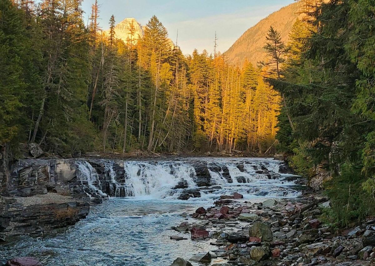 Johns Lake Loop In Montana Is A 2-Mile Hike With A Waterfall Finish