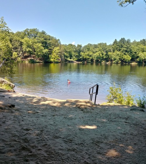 Puffer’s Pond In Amherst, Massachusetts Is A Beach With A Waterfall