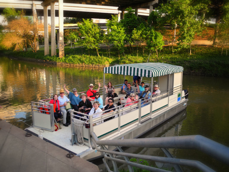 Take A Boat Tour To Watch Bats Emerge From Underneath A Texas Bridge