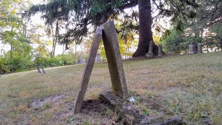 Red Rock Cemetery In Iowa Is Perched On A Hill Above The Lake