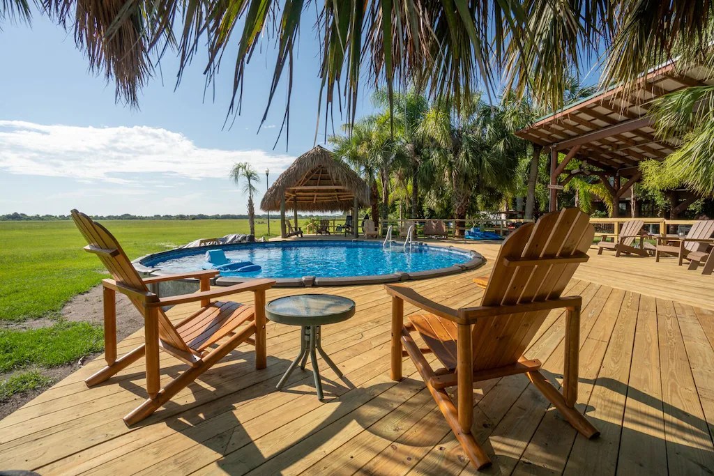 Soak In A Pool Surrounded By Natural Beauty At This Epic Rustic Cabin ...