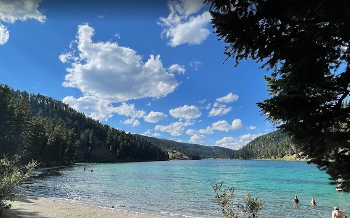 Wade Lake Is A Hidden Lake In Montana With Blue Water